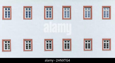historic windows with red sandstone as harmonic background Stock Photo ...