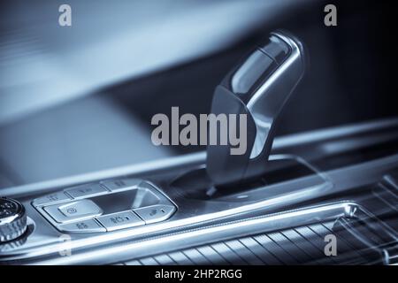 Close up shot of an automatic gear shifter in a new car Stock Photo - Alamy