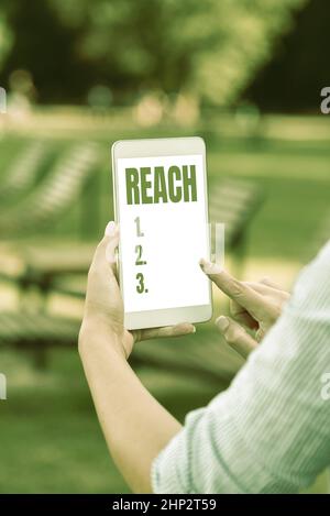 Hand writing sign Reach. Business overview the distance within which ...