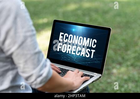 Handwriting text Economic Forecast. Concept meaning Process of making ...