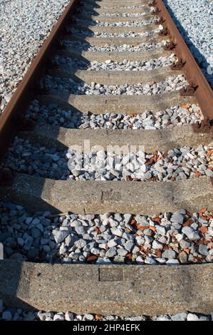 Railway tracks, the empty tracks with concrete sleepers, of a railway ...
