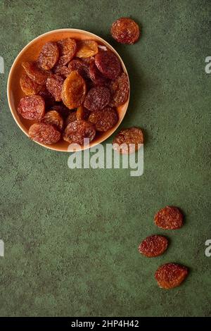 Set of bowls with tasty dried apricots isolated on white Stock Photo ...