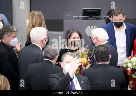 German Foreign Minister Annalena Baerbock, right, shakes hands with ...