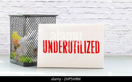 word Underutilized on black background Stock Photo - Alamy