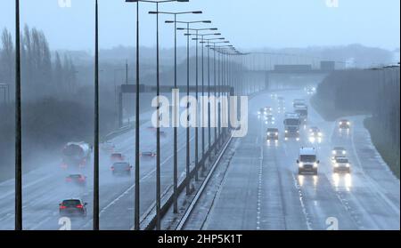 Peterborough, UK. 18th Feb, 2022. Heavy rain on the A1 (M) as the Met ...