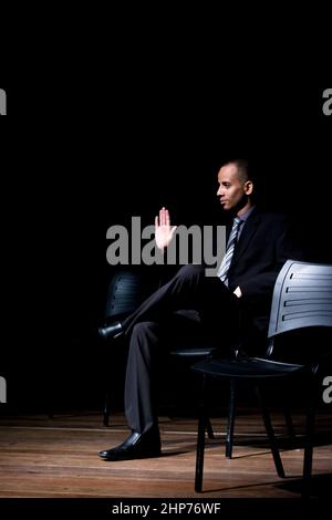 Actor on stage represents a dramatic character. Scene in a theater in ...