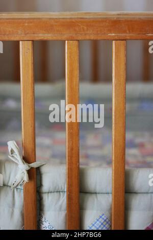 The vertical slats on a vintage baby crib Stock Photo - Alamy