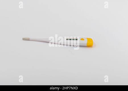 Yellow Digital Thermometer Isolated on White Background Stock Photo - Alamy