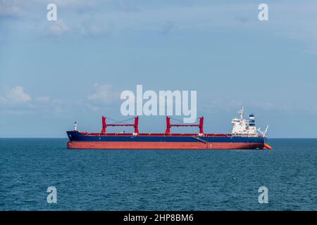 Lowering and Maneuvering orange free fall lifeboat in water. Abandon ...