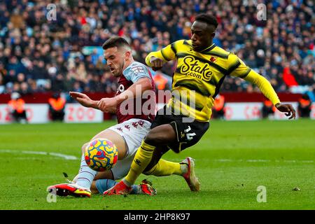 John McGinn of Aston Villa is tackled by Ao Tanaka of Leeds United ...