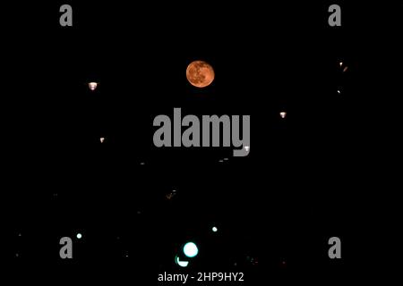 A February's Full Snow Moon rises in London. Native American tribes ...