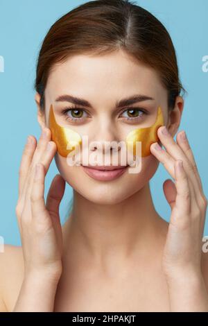 woman patches rejuvenation skin care fun after shower close-up ...