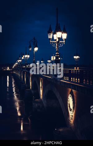 Famous stone bridge in Bordeaux by night, France Stock Photo - Alamy