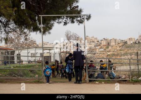 Religious Jews in Neve Yaakov also Neveh Ya'aqov a Jewish neighborhoods ...