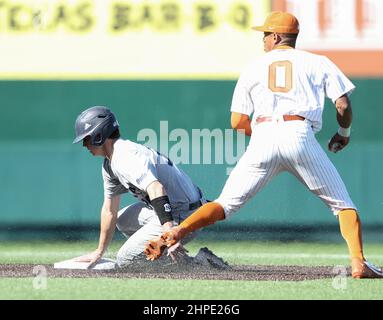 Rice catcher Justin Long (30) warms up between innings against Texas ...