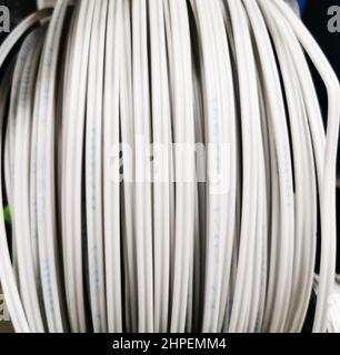 Close-up of an internet fiber supply cable snapped by a windstorm in a ...