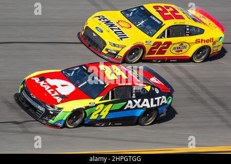 Joey Logano (22) and William Byron (24) lead drivers through the front ...