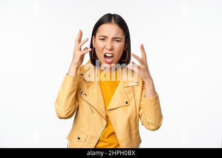 Asian angry woman arguing, shaking hands angry and screaming, shouting ...