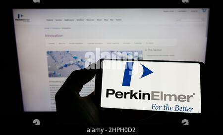 PerkinElmer company logo on a website with blurry stock market ...