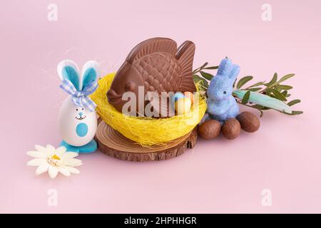 Delicious Easter chocolate assortments on a pink table Stock Photo - Alamy
