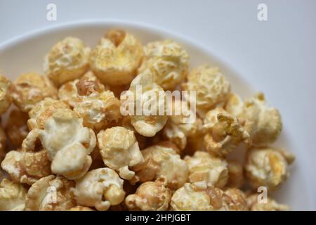 Popcorn covered with icing and caramel with sugar Stock Photo - Alamy