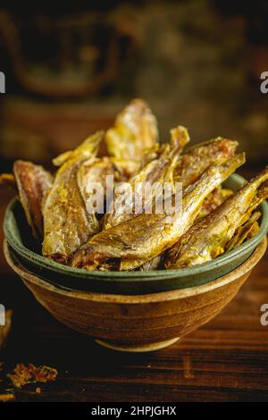 Crispy Fried small yellow croaker Stock Photo - Alamy