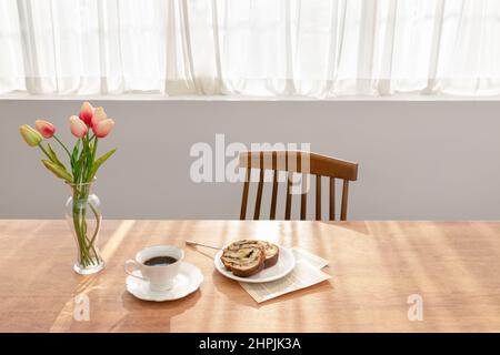 relax cozy objects and background with bread, coffee, candle, a book ...