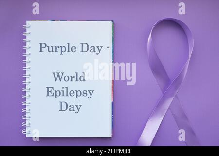 Purple day. Epilepsy awareness day. Awareness Purple ribbon Stock Photo ...