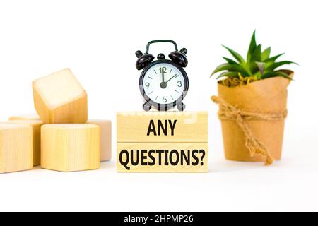 White clock with words Time for Questions on its face Stock Photo - Alamy