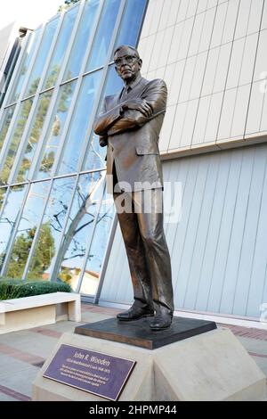 A statue of UCLA Bruins former coach John Wooden at Pauley Pavilion ...