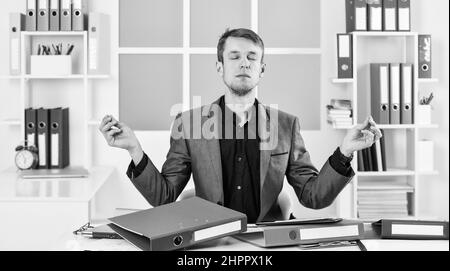 yoga at work. secretary practicing yoga. skilled and successful ceo ...