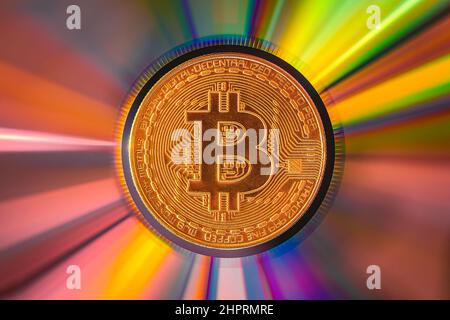 Bitcoin coin on a CD - DVD, background for design Stock Photo - Alamy