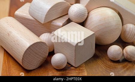 Different wooden blocks and wooden balls Stock Photo - Alamy