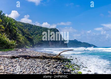 scenic ocean landscape in Dominica with huge waves and view to the ...