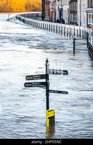 Flood defence barriers hold back flood water in Ironbridge, Shropshire ...