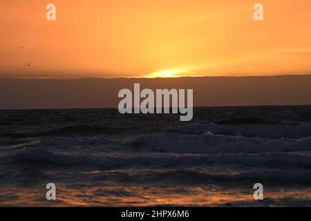 Spectacular Sunset Light at Moss Landing Beach Stock Photo - Alamy
