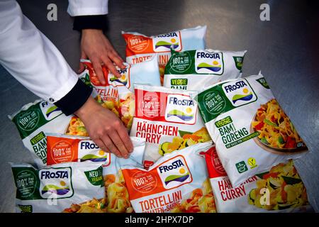 Bremerhaven, Germany. 23rd Feb, 2022. An employee works in Frosta's ...