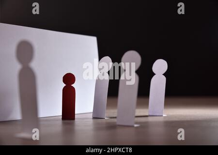 Concept of abuse with cutouts of schoolchildren with young people ...