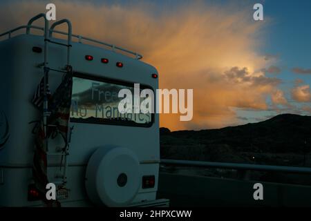 Kingma, USA. 23rd Feb, 2022. The convoy exits Route 40 at Kingman, AZ ...