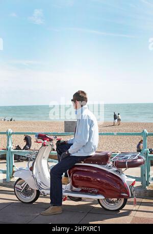 Mod riding a lambretta at a vintage retro festival. UK Stock Photo - Alamy