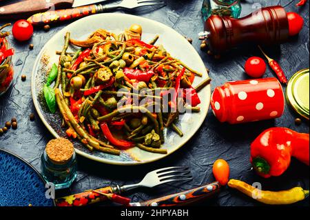 Spicy vegetable appetizer made from pepper, asparagus beans, tomato and ...