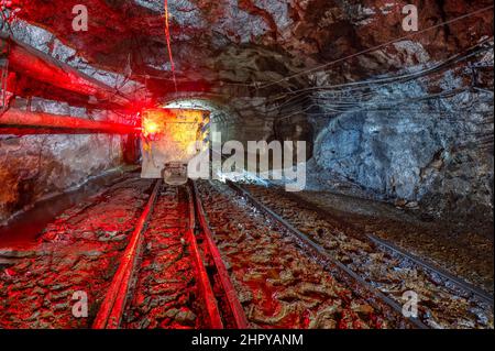 Underground mine. Underground railway for transporting ore. Mine ...