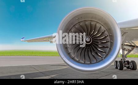 Jet engine and wing chassis parked at the airport Stock Photo - Alamy