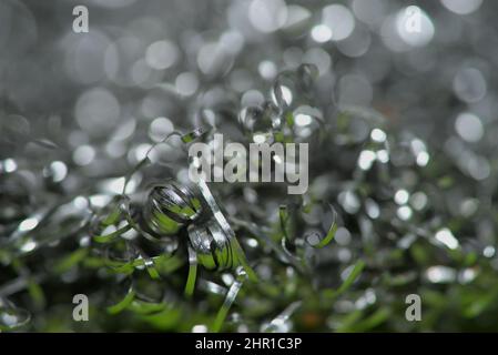 background of steel tangled metal fibers, close-up macro photography ...