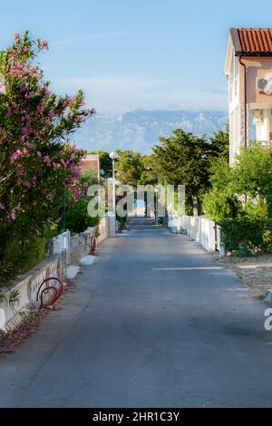 A small alley towards the sea Stock Photo - Alamy