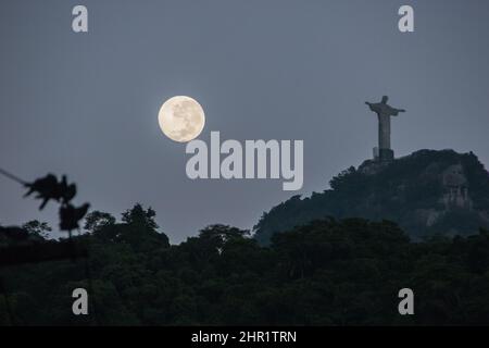 The statue of Christ and the full moon, Rio de Janeiro, Brazil Stock ...