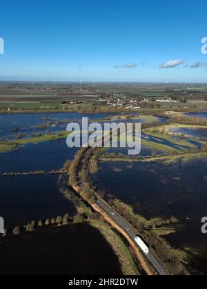Welney, UK. 23rd Feb, 2022. The Welney wash area is beginning to fill ...