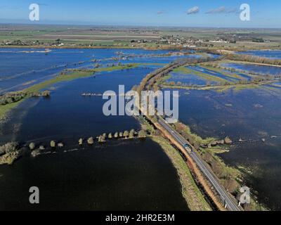 Welney, UK. 23rd Feb, 2022. The Welney wash area is beginning to fill ...