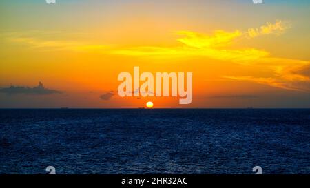 A view of a sunset in front of Oranjestad capital of Aruba Stock Photo ...