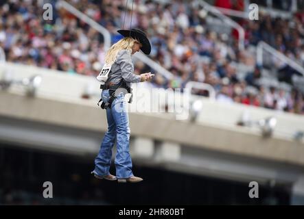 Barrel racer Carlee Pierce of Marietta, Okla., takes a selfie as she is ...